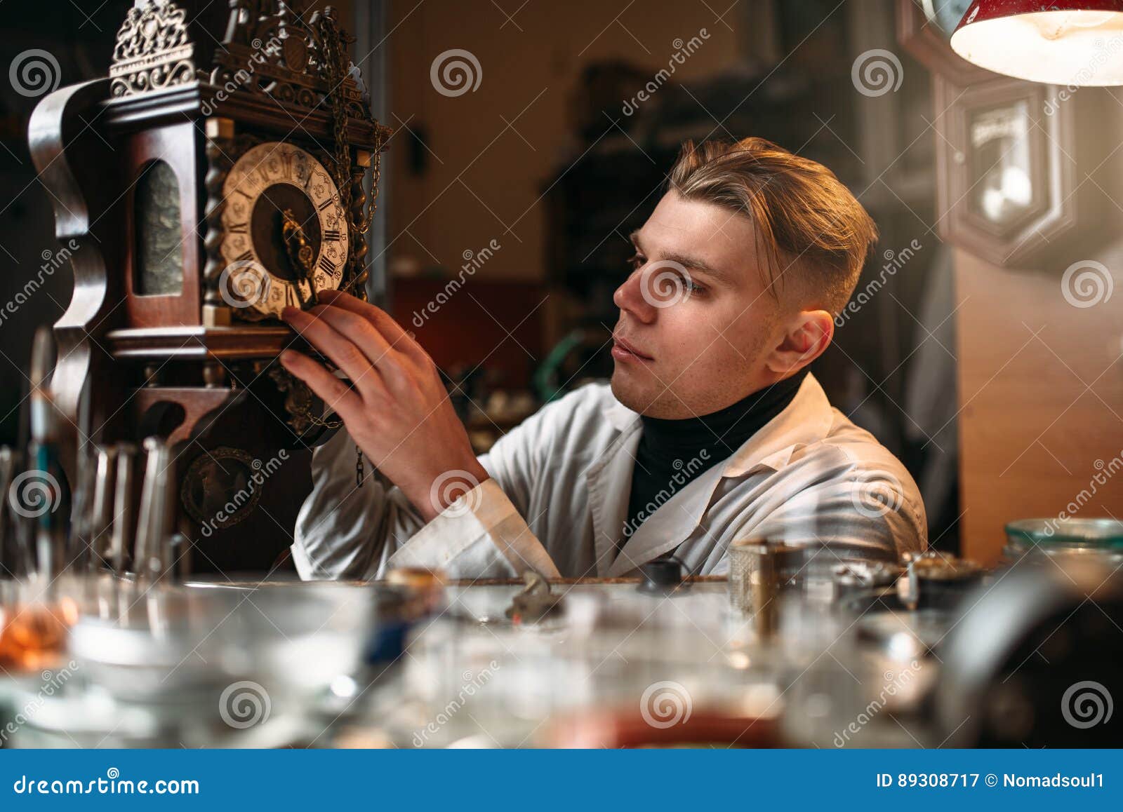 Watchmaker Adjusts the Mechanism of Old Wall Clock Stock Image - Image ...