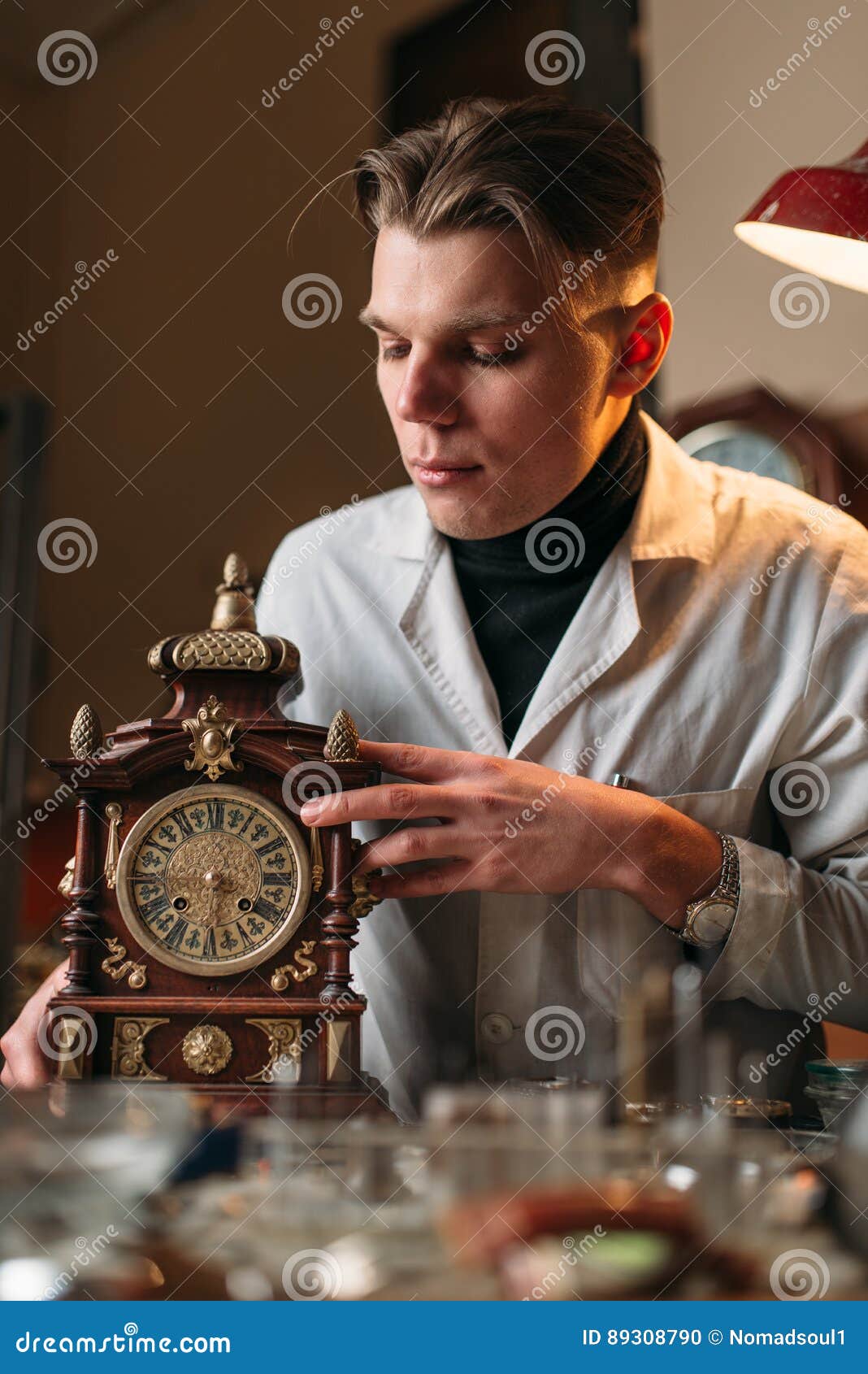 Watchmaker with Old Mechanical Desk Clock Stock Photo - Image of ...