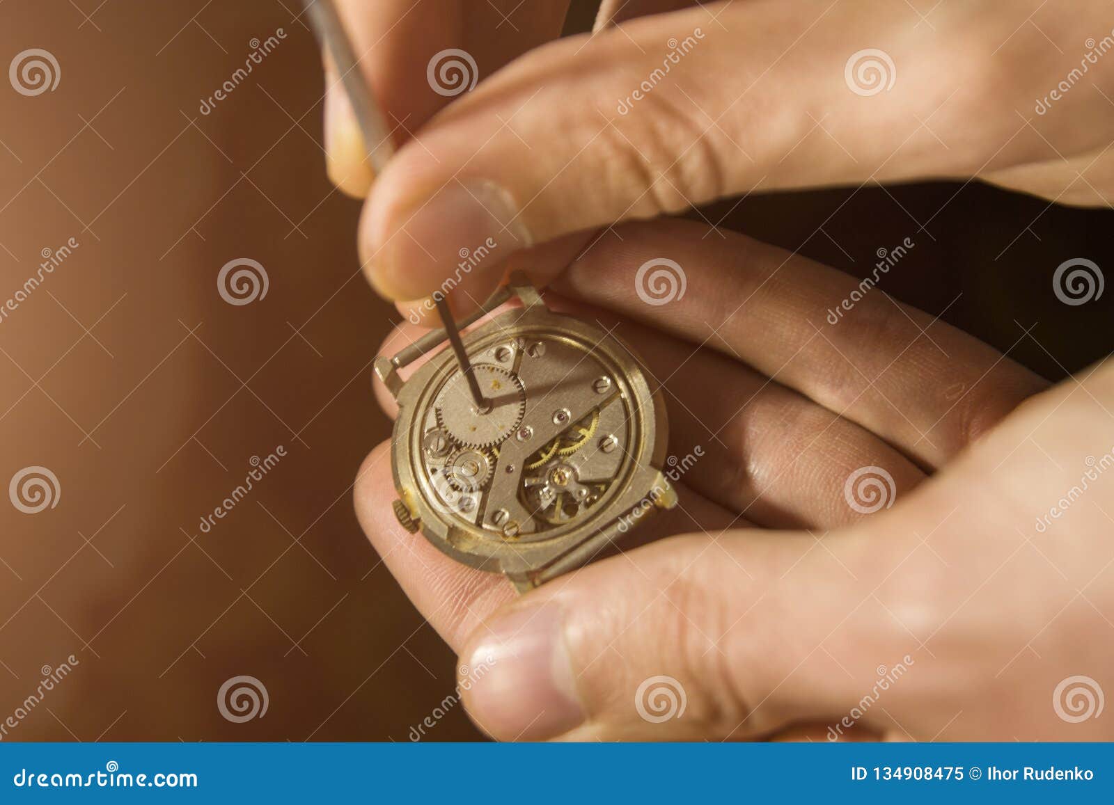 Watchmaker is Repairing the Mechanical Watches in His Workshop Stock ...