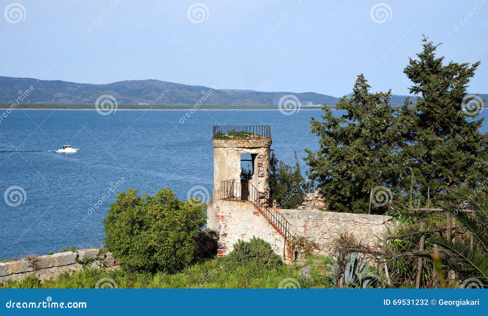 Watchtower over the sea stock photo. Image of coast, boat - 69531232