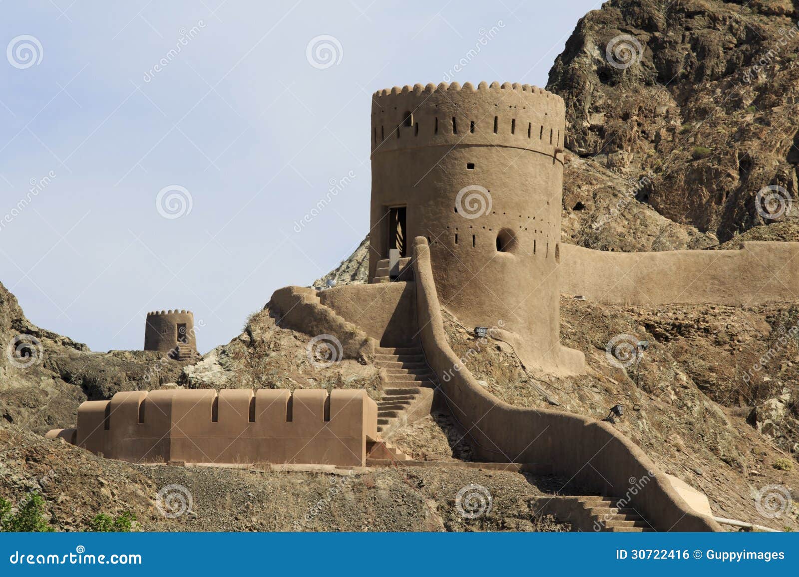 Watchtower with Steps and Mountains in Old Muscat Stock Photo - Image ...