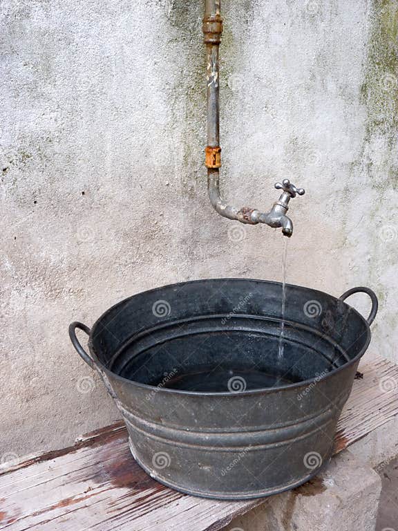 Water into basin stock photo. Image of aged, antique - 15516668