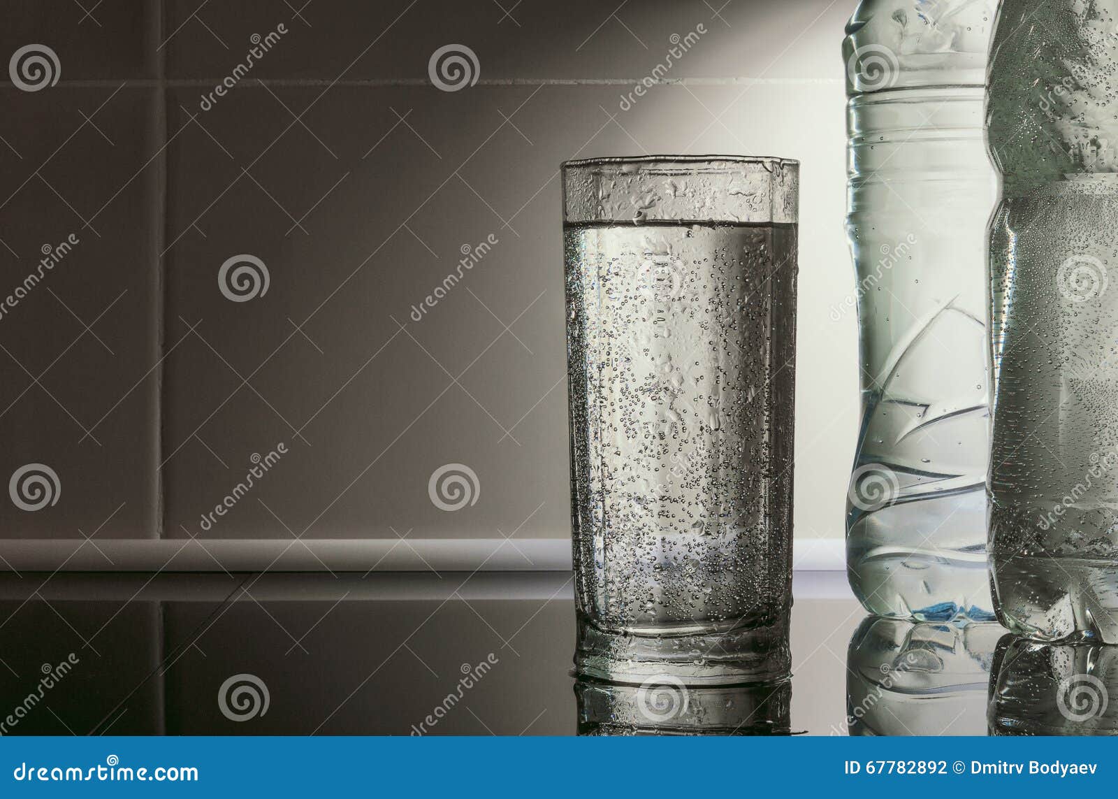 The Water in the Beaker on a Background of Light Rays. Stock Photo ...