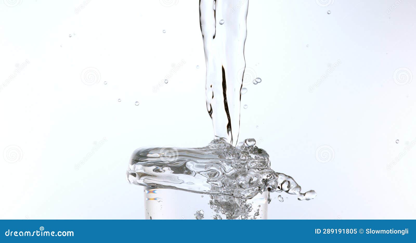 Water Being Poured into Glass Against White Background Stock Image ...