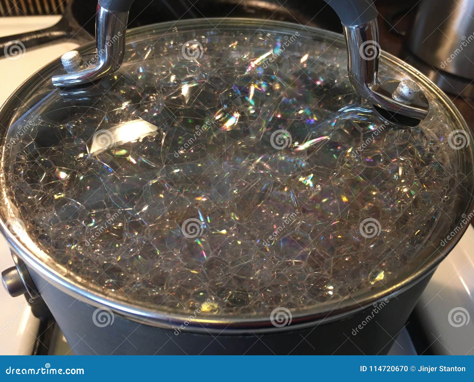 Water boiling in pot stock photo. Image of bubbles, boiling - 114720670