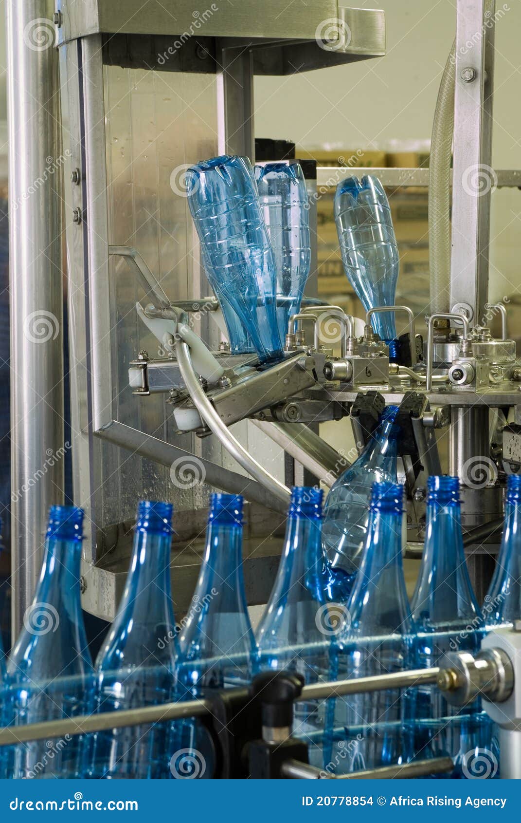 Water Bottle Production Machine Stock Photo - Image of bottle, assembly ...