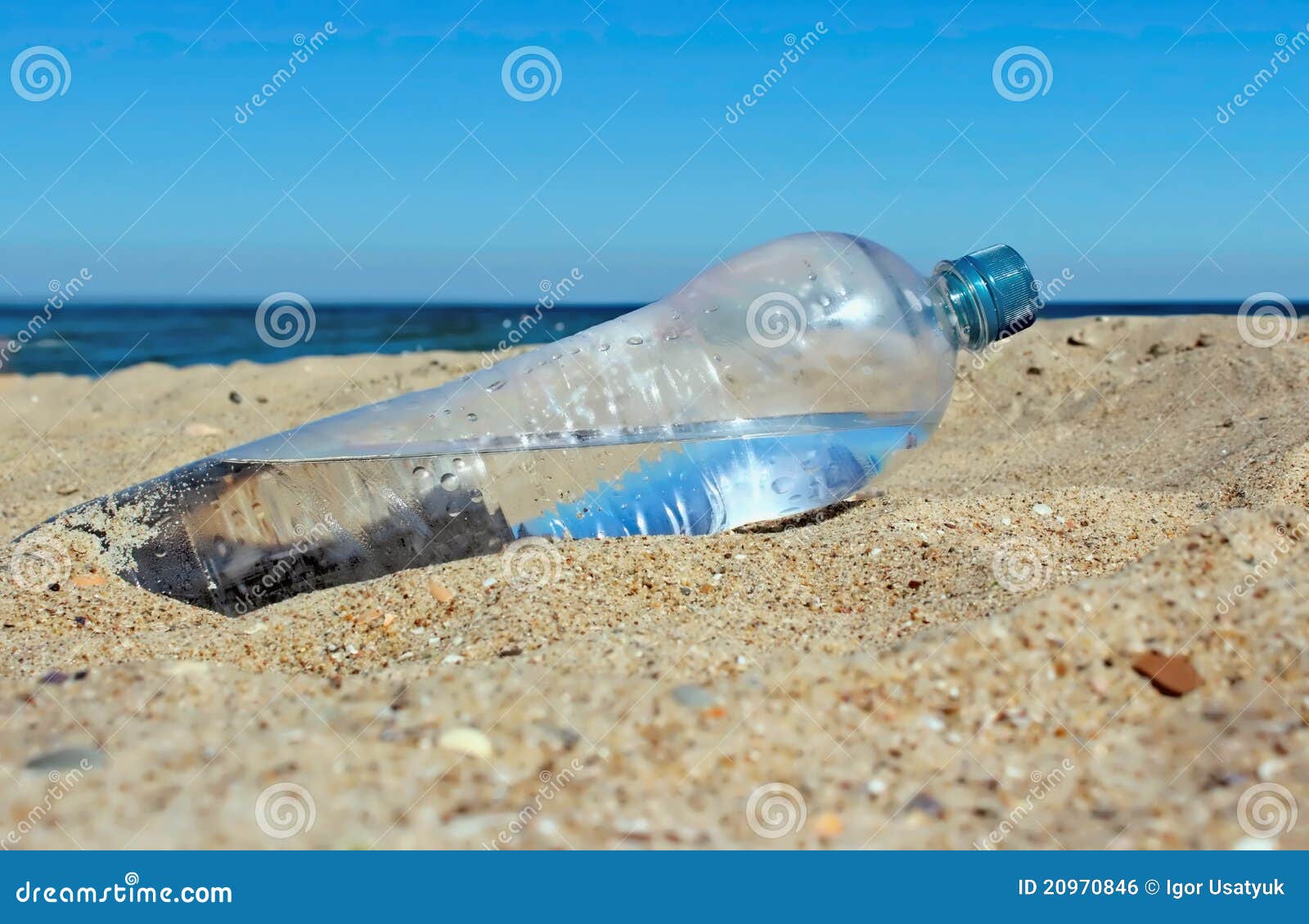 Water bottle on sand stock photo. Image of summer, wave - 20970846