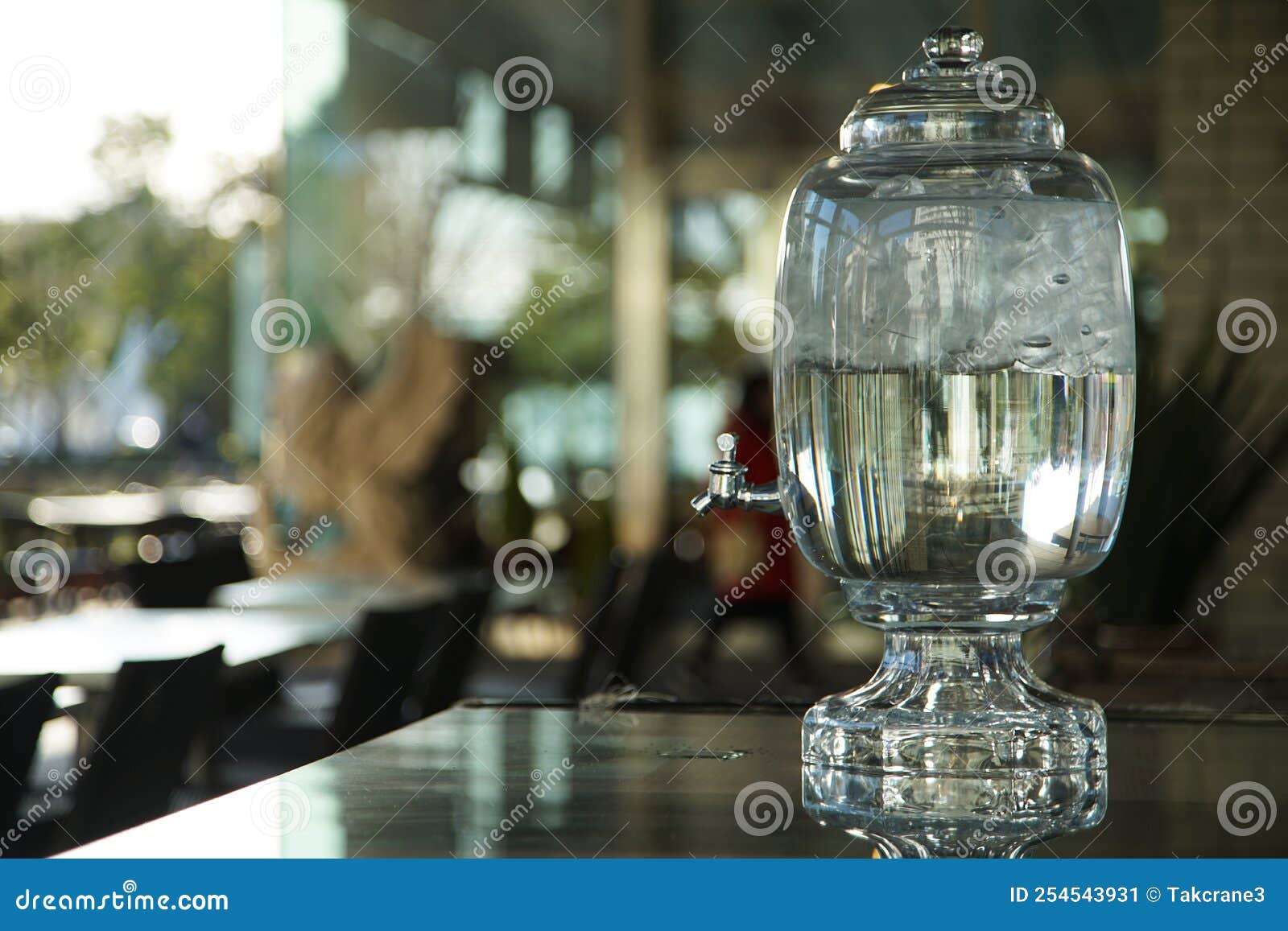 Water bottle on the table stock image. Image of wooden - 254543931