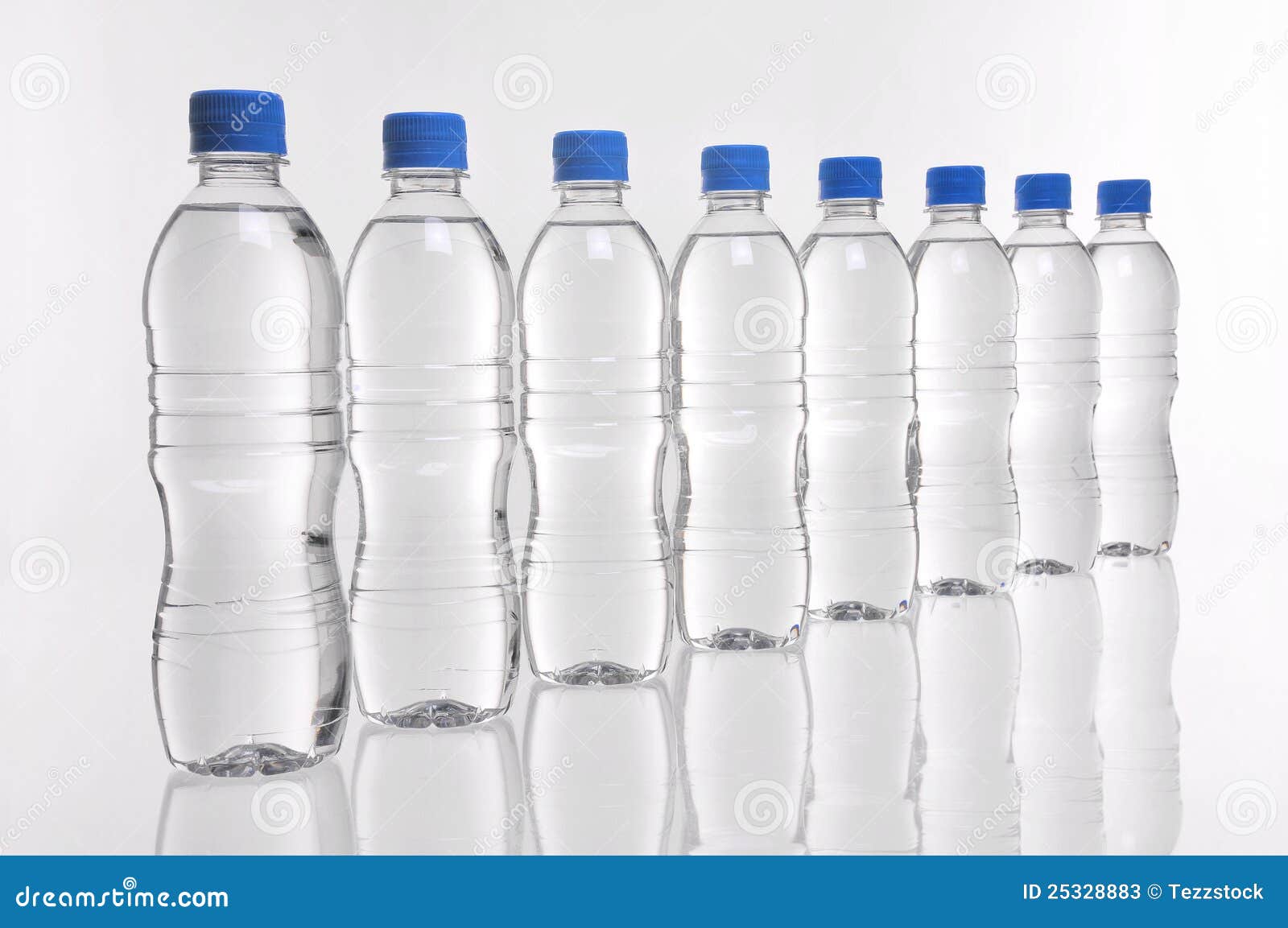 Water bottles in a line stock image. Image of liquid - 25328883