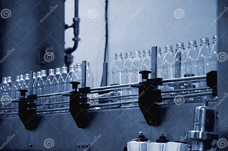 Water bottling line stock image. Image of uniform, productivity - 8037087