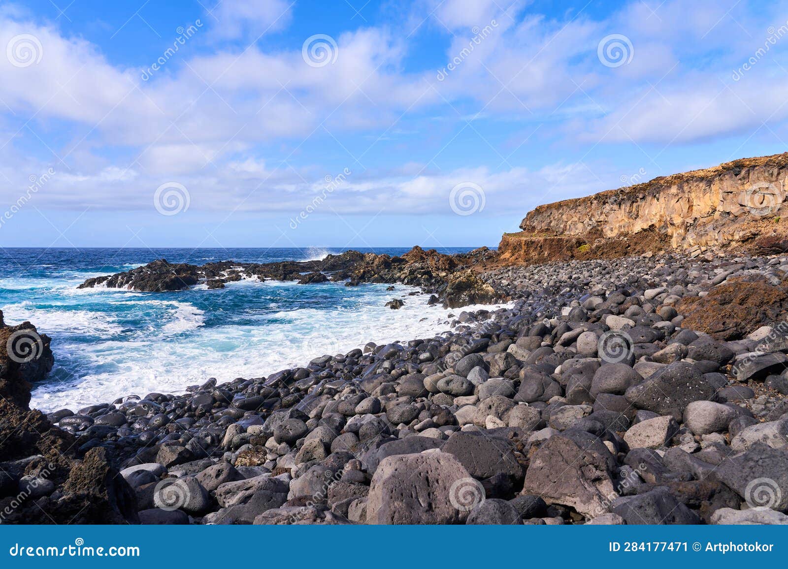 Water Breaks on Pebbles and Rocks on an Empty Beach in the Atlantic ...