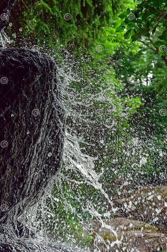 Water is Broken Down on a Rock. Splatter Stock Photo - Image of park ...
