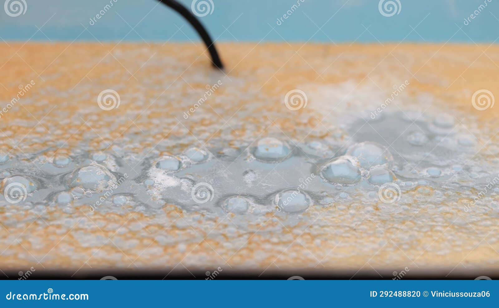 Water and Bubbles with Rust on the Surface from an Electrolysis Stock ...