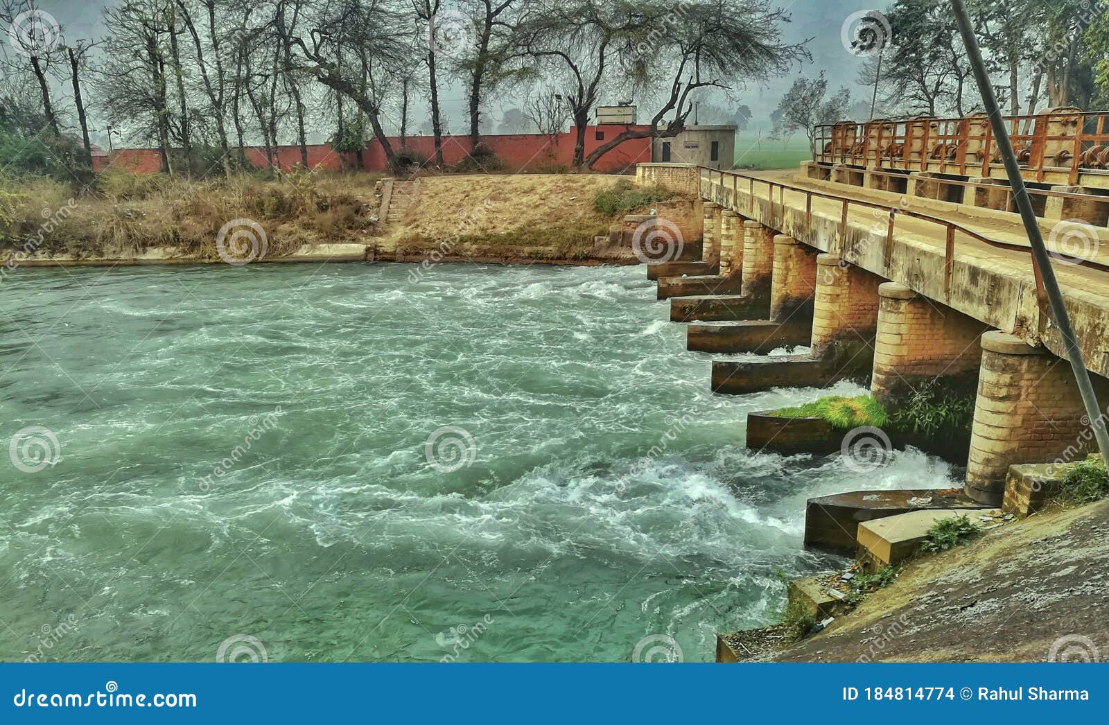 Water canal in India stock photo. Image of bridge, shore - 184814774
