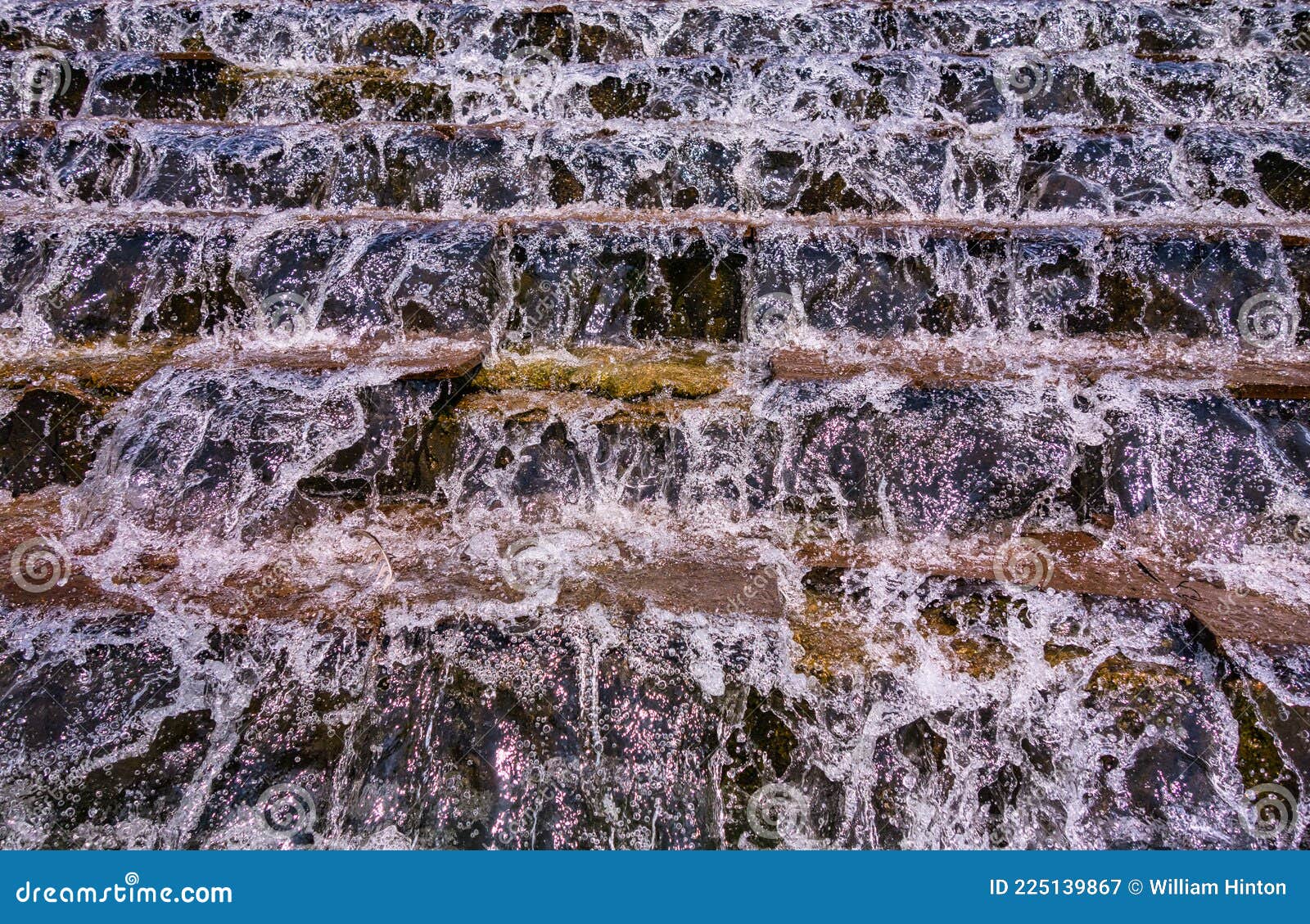 Water Cascading Down a the Steps of a Water Feature Stock Image - Image ...