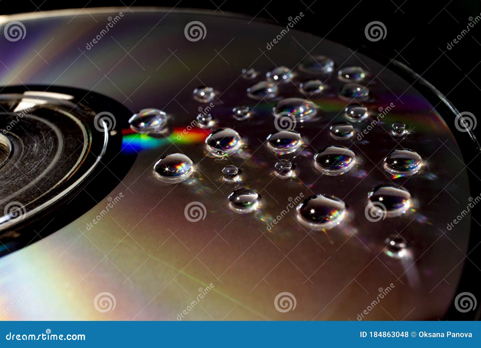 Water on the CD. stock photo. Image of rain, horizontal - 184863048