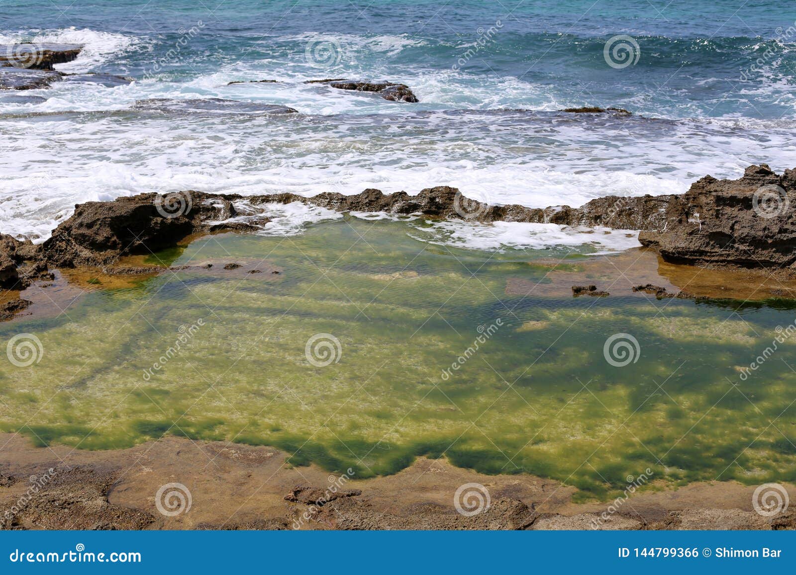 Shallow water color stock photo. Image of wind, waves - 144799366