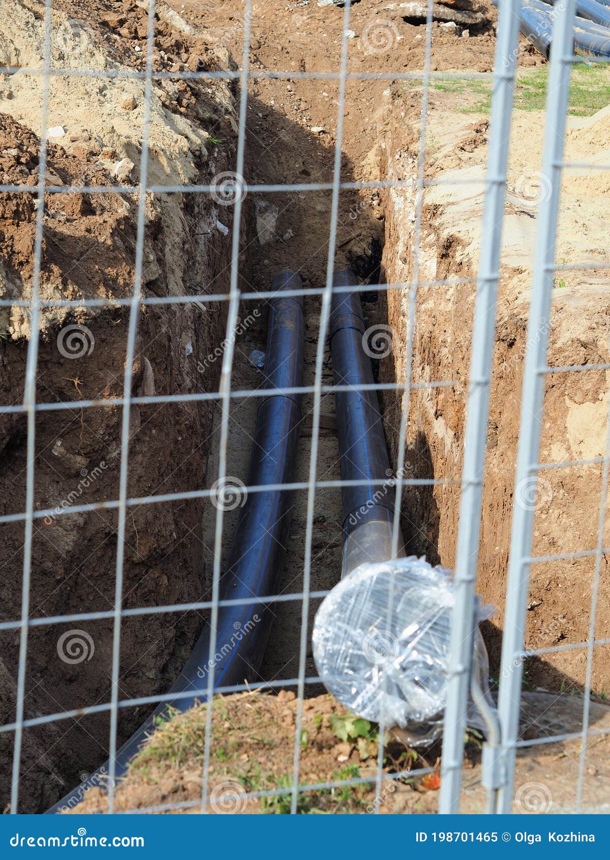 Repair Work on Laying Pipes in the Ground. Stock Image - Image of ...