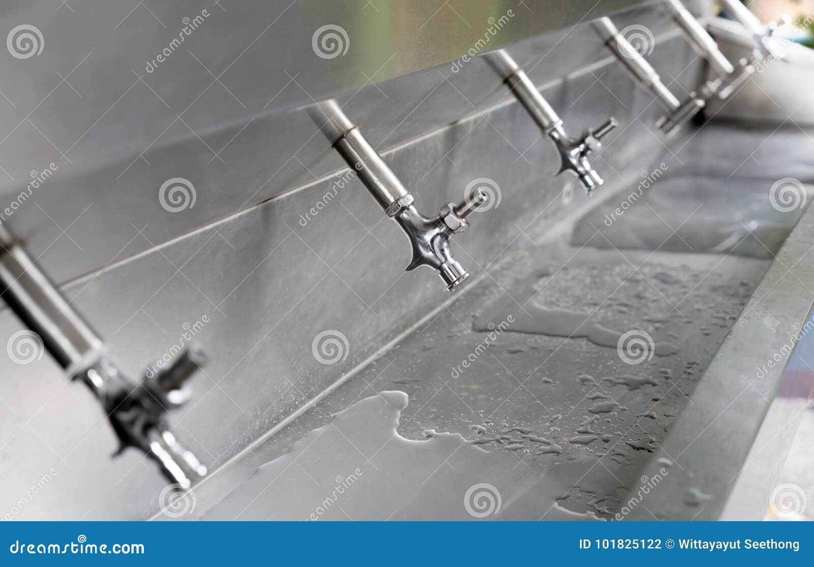 Water Cooler for Drink Use in School. Water Taps of Drinking Water in a ...