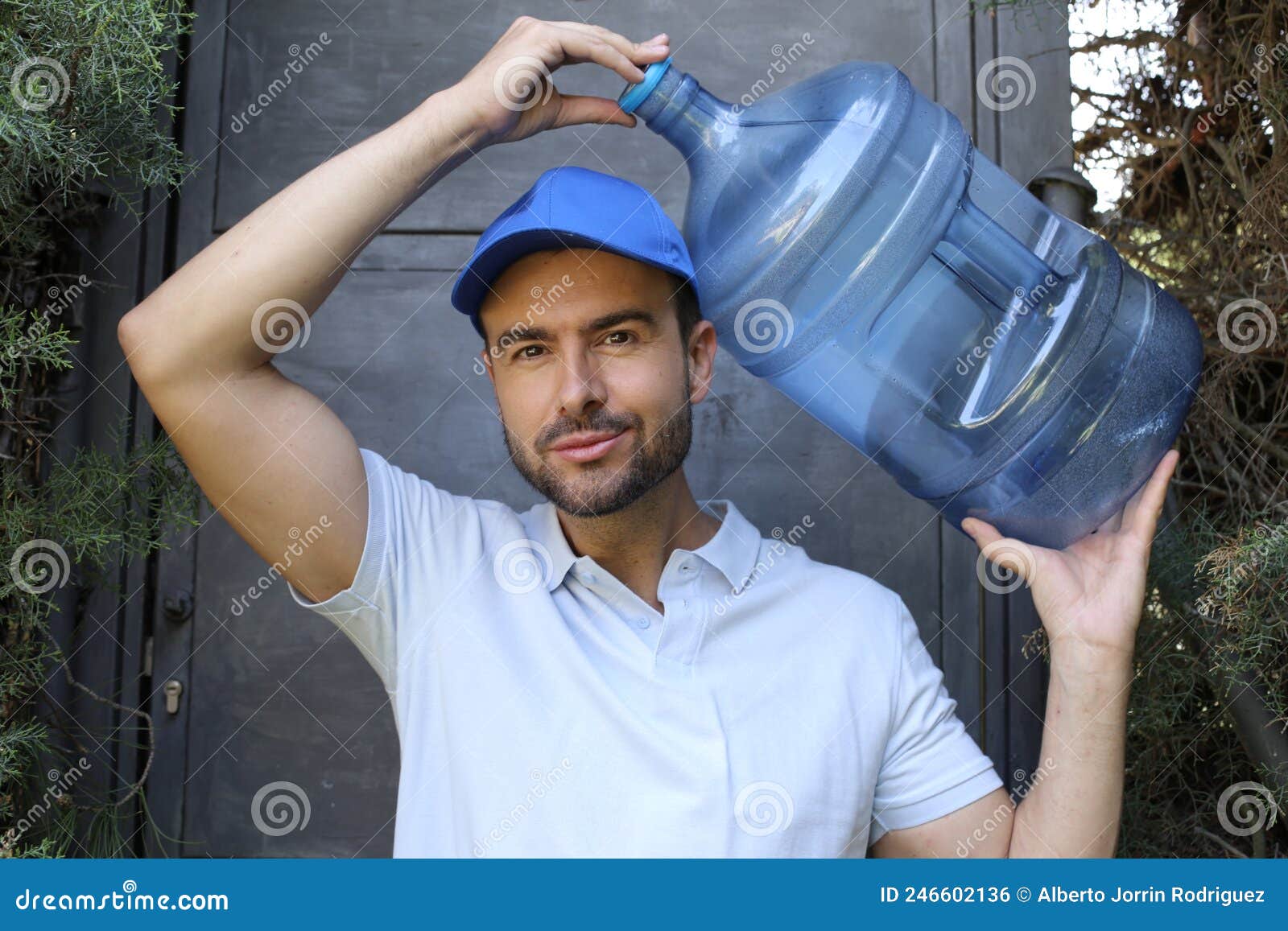 Water Delivery Man in Blue Uniform Stock Photo - Image of grocery ...