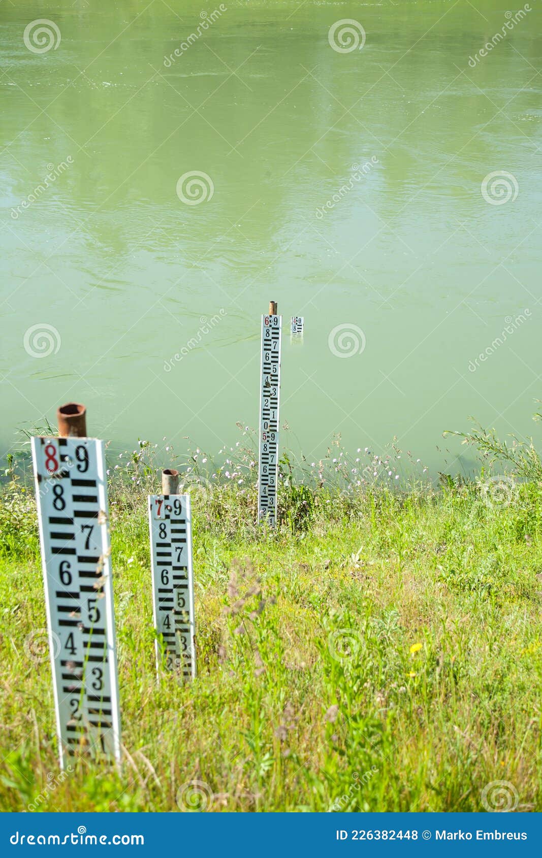 Water Depth Signs on Riverbank Stock Photo - Image of water ...