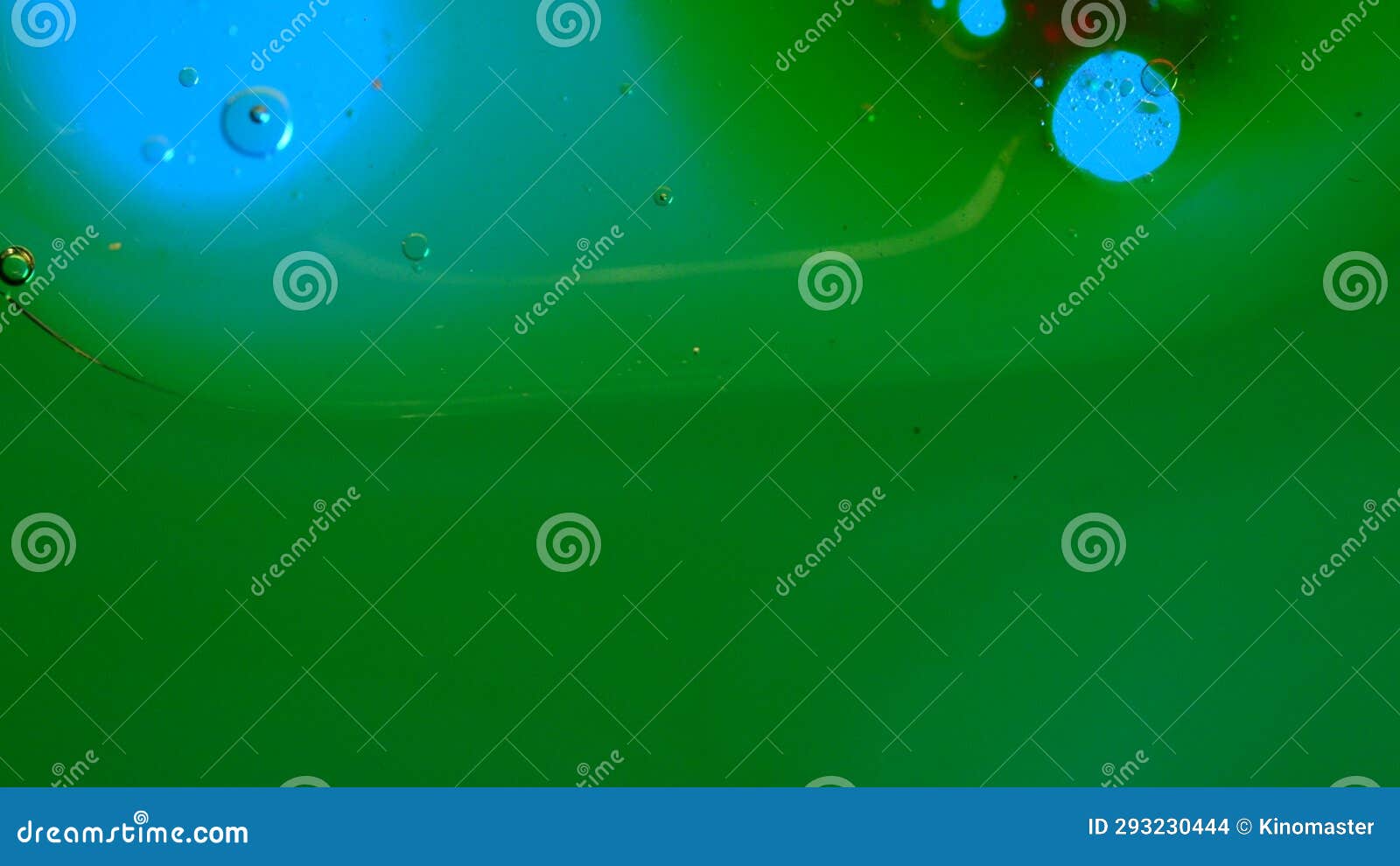 Green Colored Water Surface with Blurred Oil Droplets and Ink Flows ...