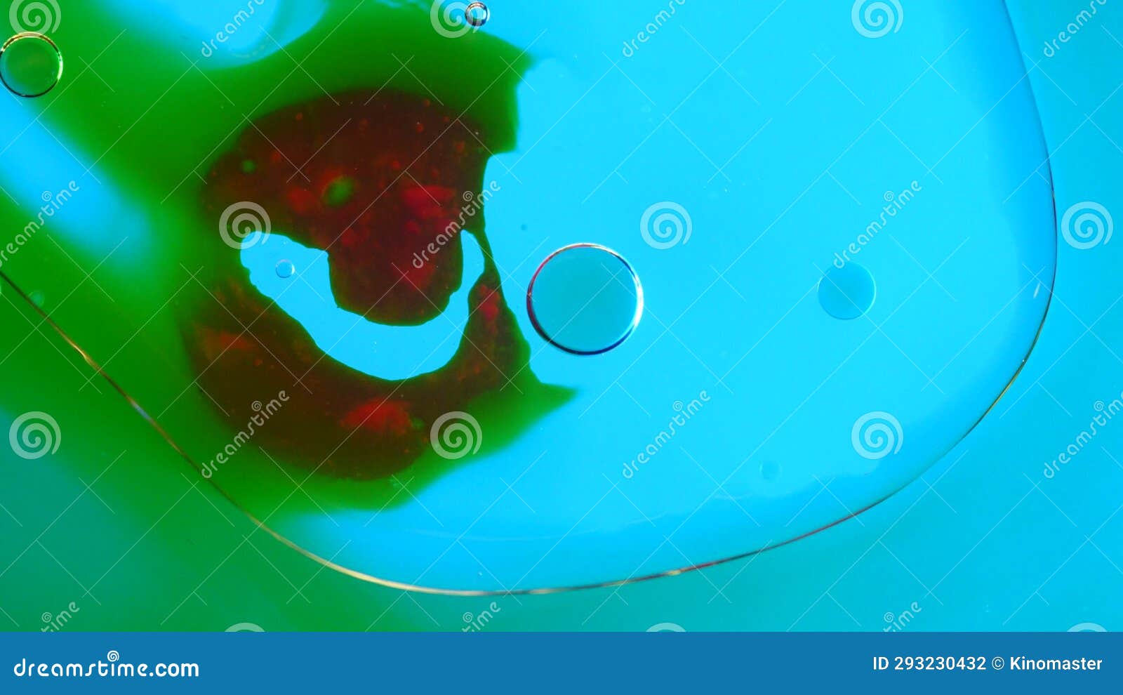 Nature Green Colored Water Surface with Red Ink and Oil Droplets ...