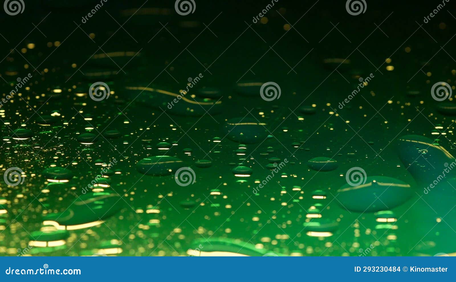Green Light Colored Water Surface with Oil Drops Floating Mixing in ...