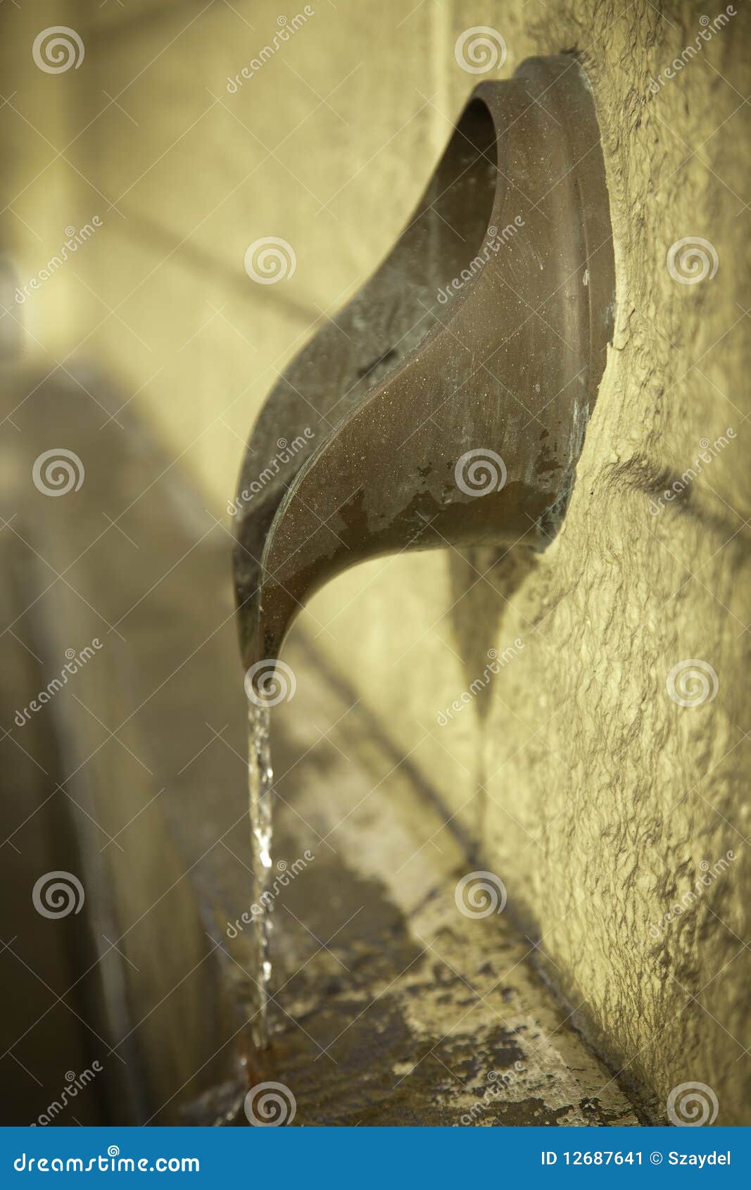 Water Dripping from a Brass Spout Stock Image - Image of sunny ...