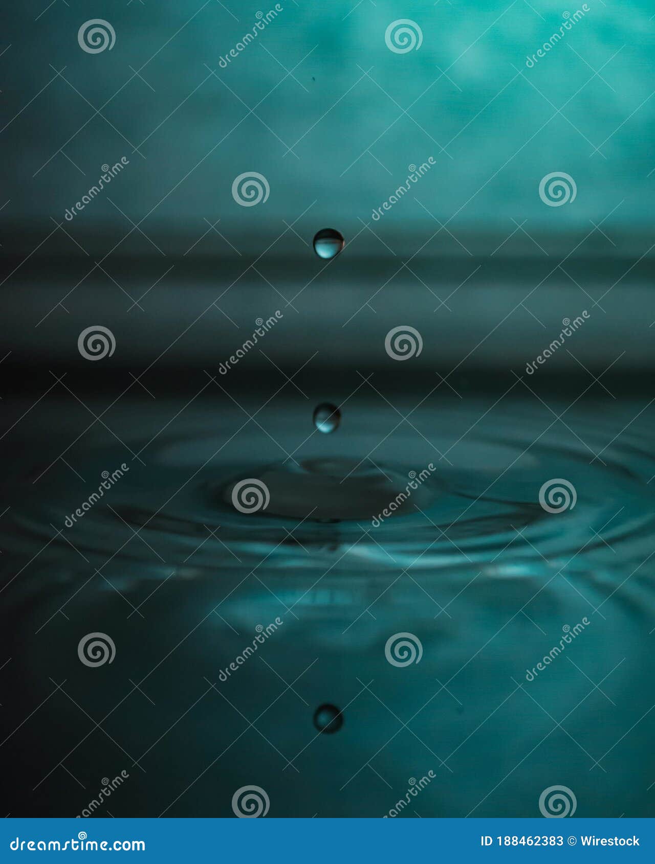 Water Dripping and Splashing with a Blue Effect Stock Image - Image of ...