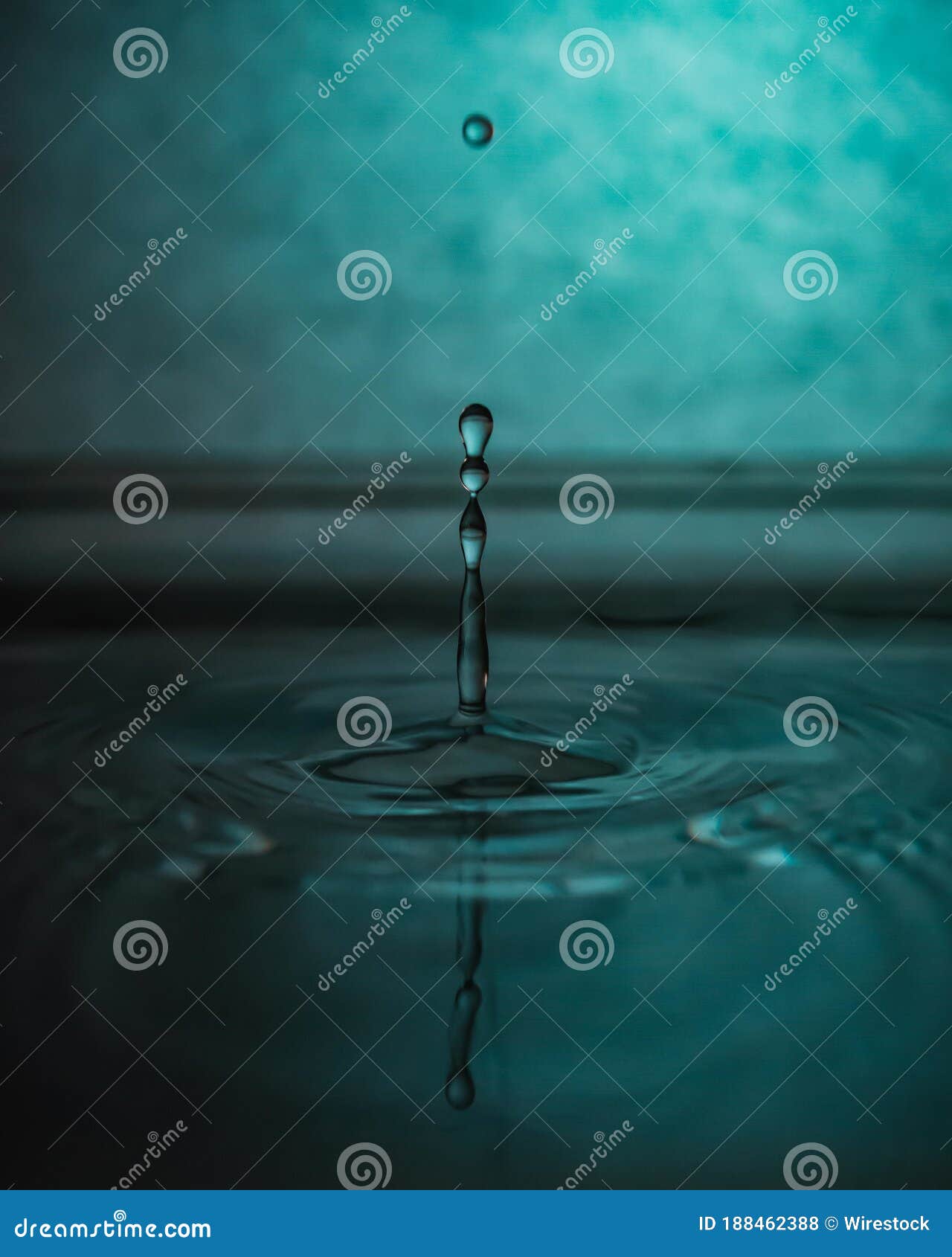Water Dripping and Splashing with a Blue Effect Stock Photo - Image of ...