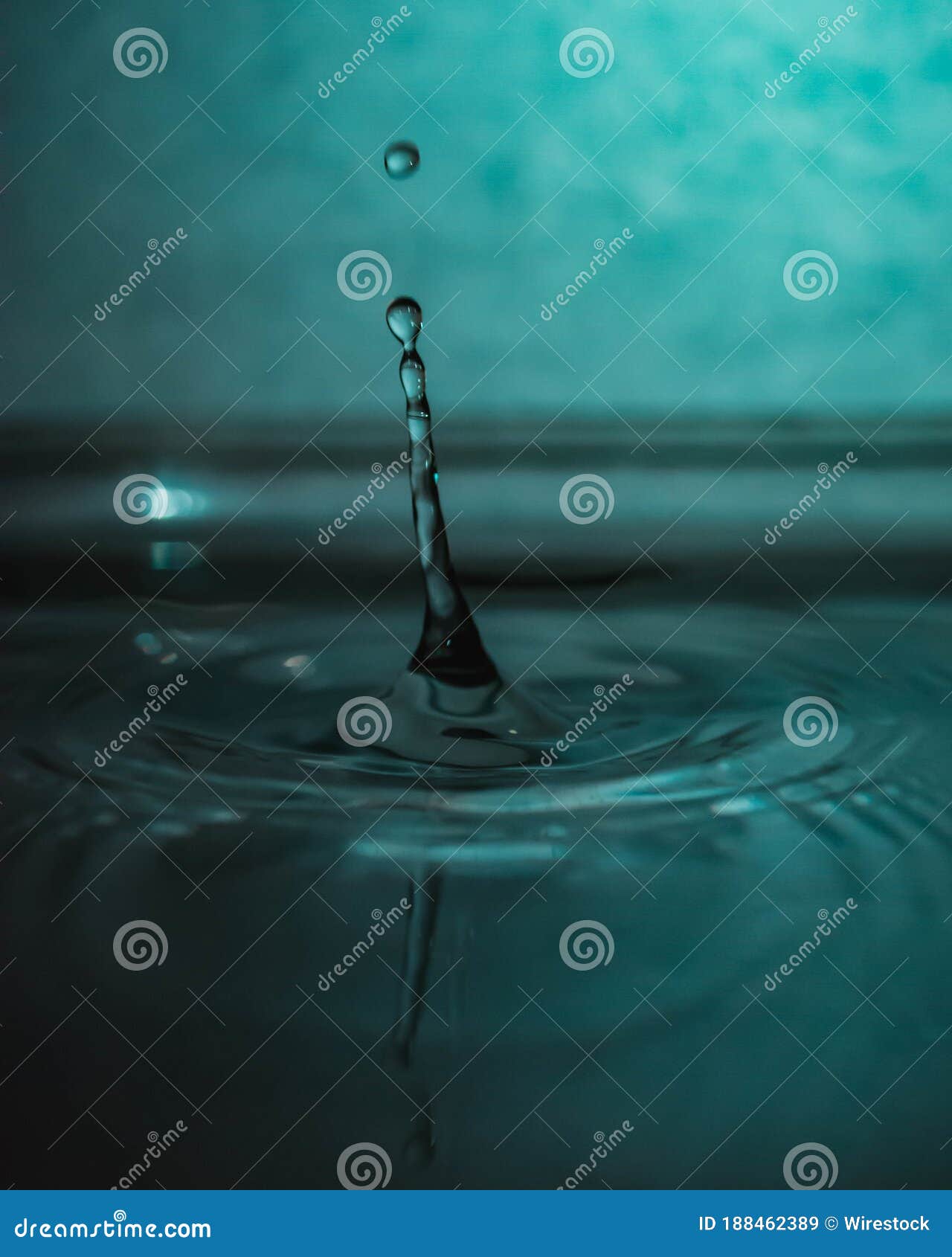 Water Dripping and Splashing with a Blue Effect Stock Image - Image of ...