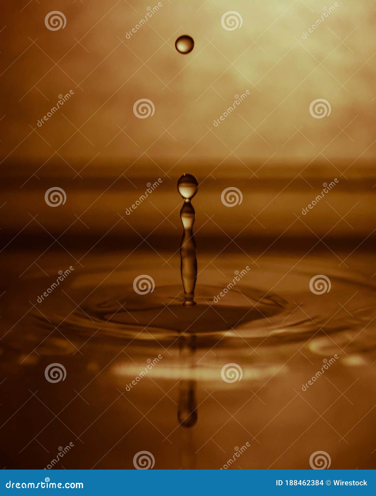 Water Dripping and Splashing with a Yellow Effect Stock Photo - Image ...