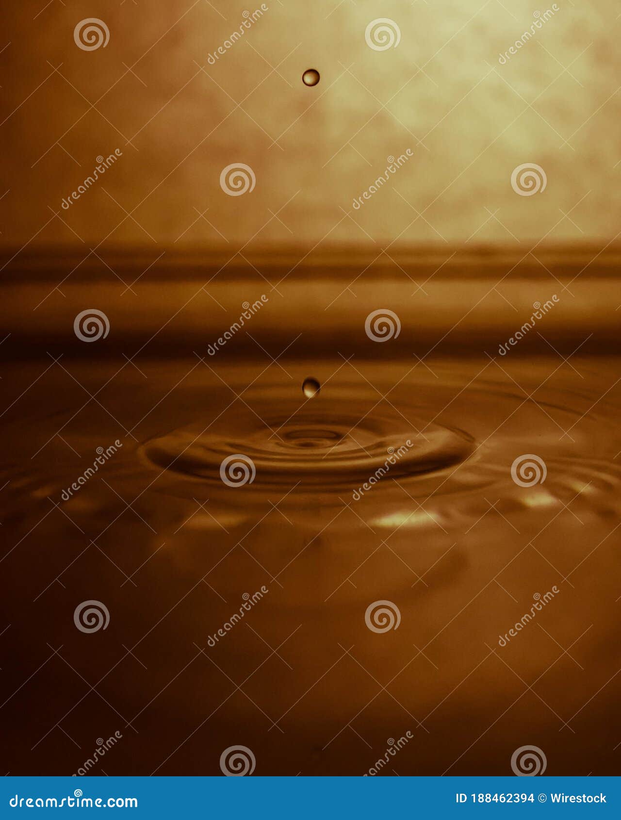 Water Dripping and Splashing with a Yellow Effect Stock Photo - Image ...