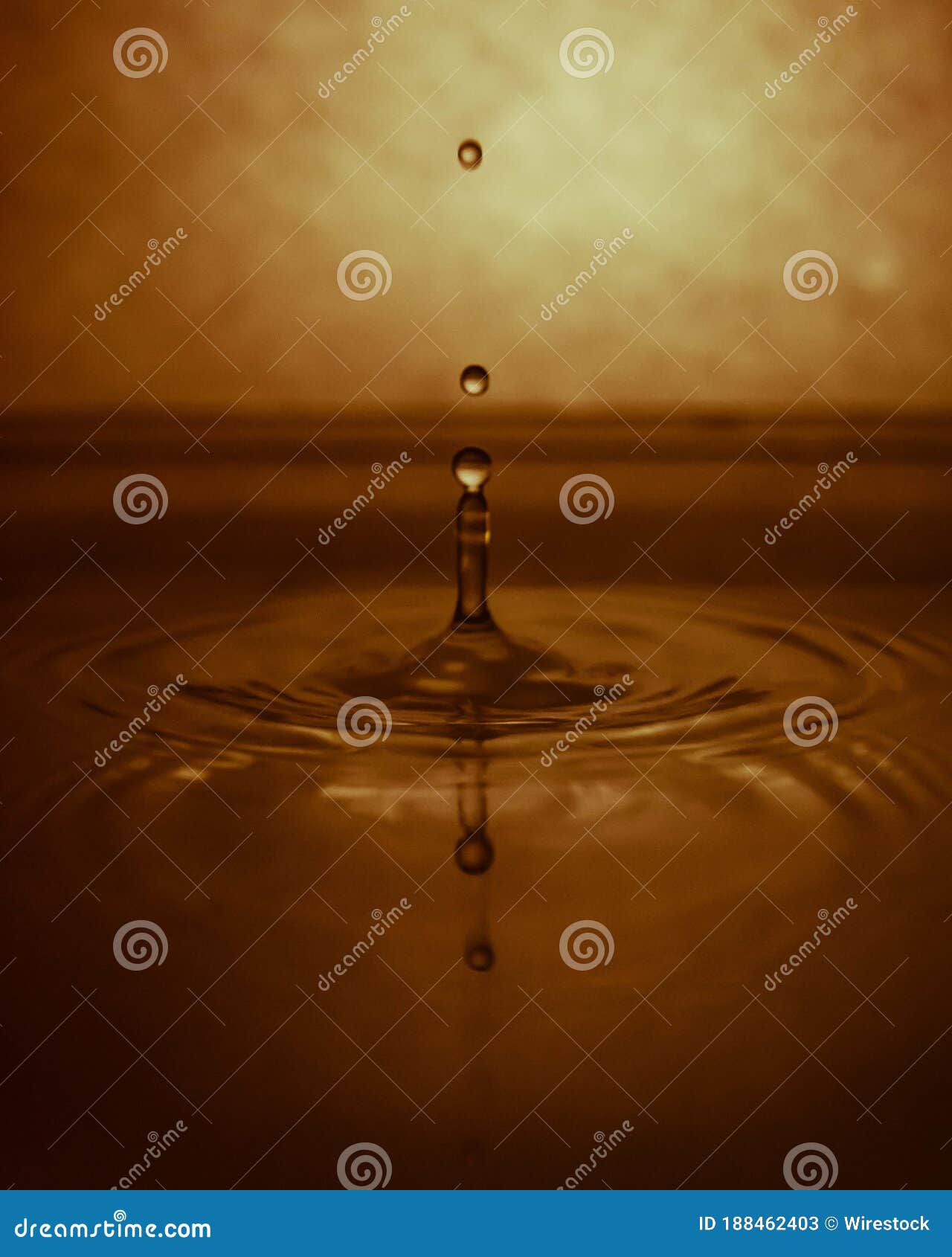 Water Dripping and Splashing with a Yellow Effect Stock Image - Image ...