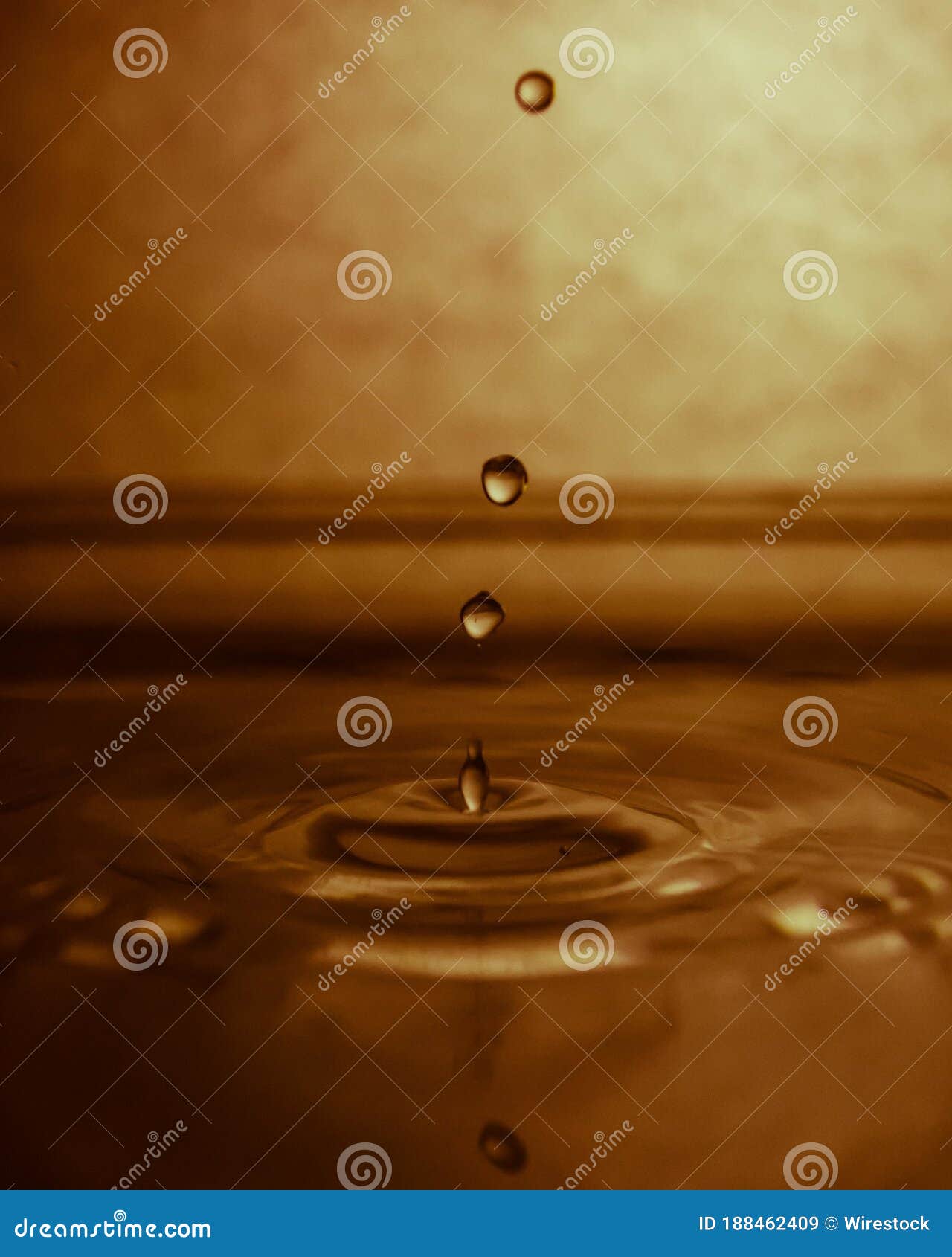Water Dripping and Splashing with a Yellow Effect Stock Image - Image ...