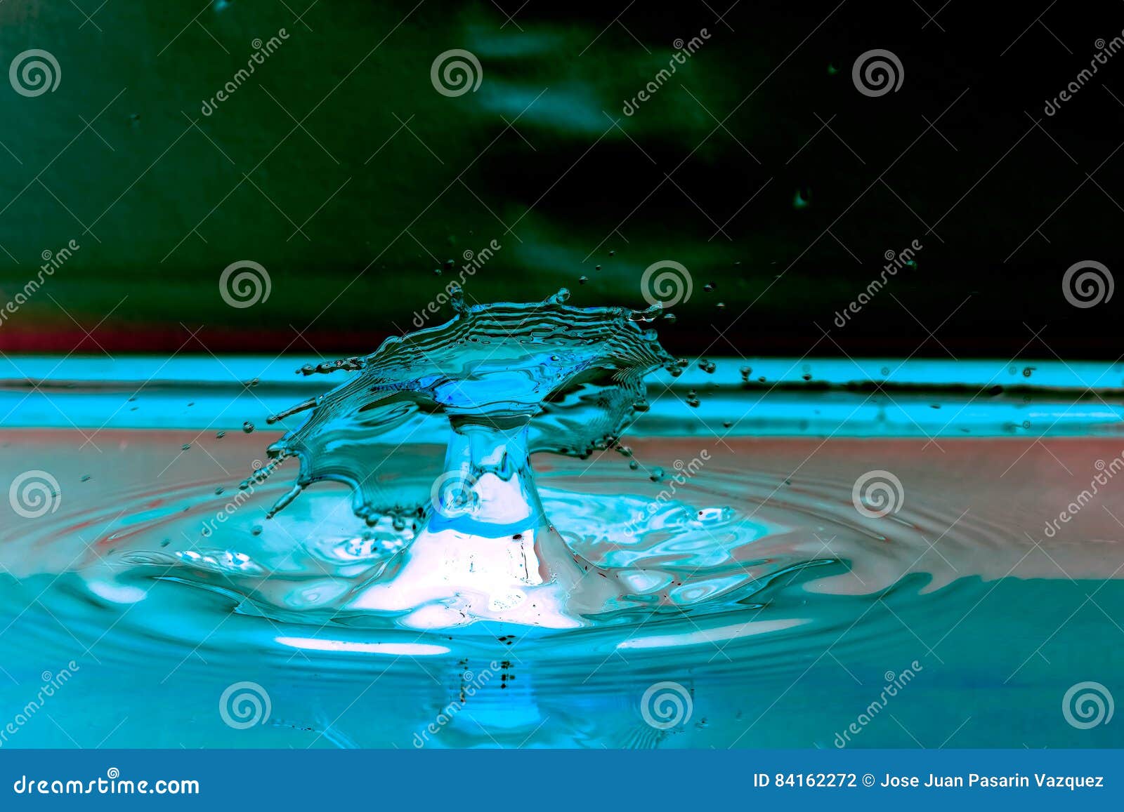 Water drop collision stock photo. Image of reflection - 84162272