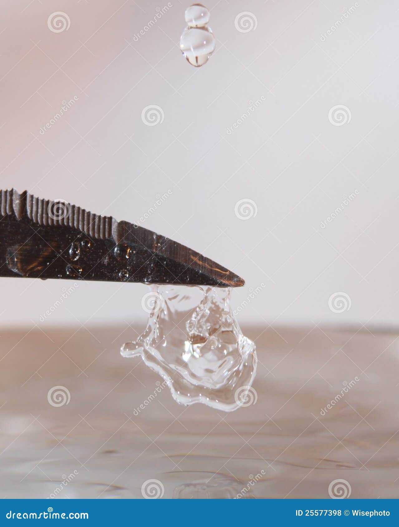 Water Drop Cut by Knife stock photo. Image of relationships - 25577398