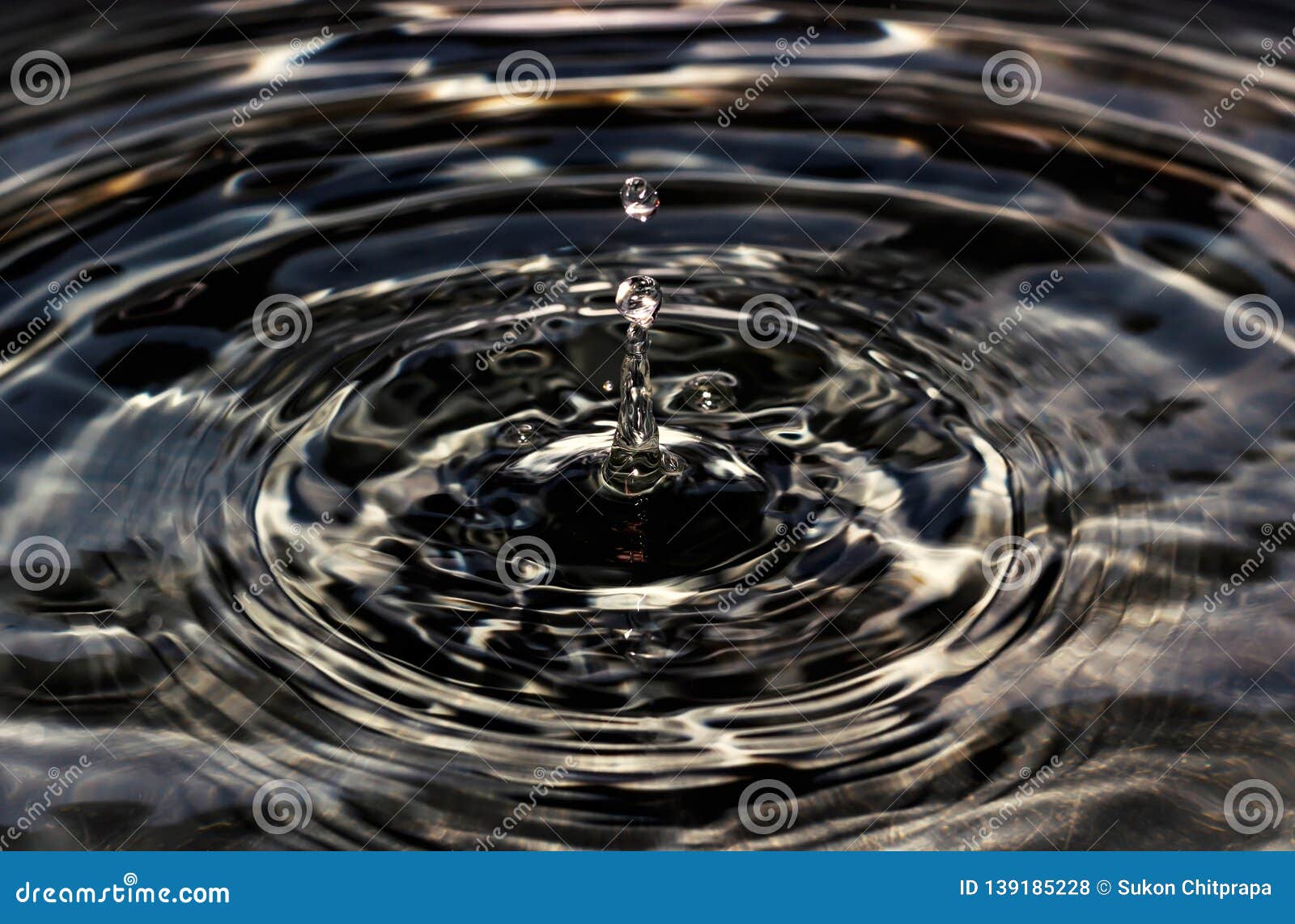 Water drop on dark tone stock photo. Image of abstract - 139185228
