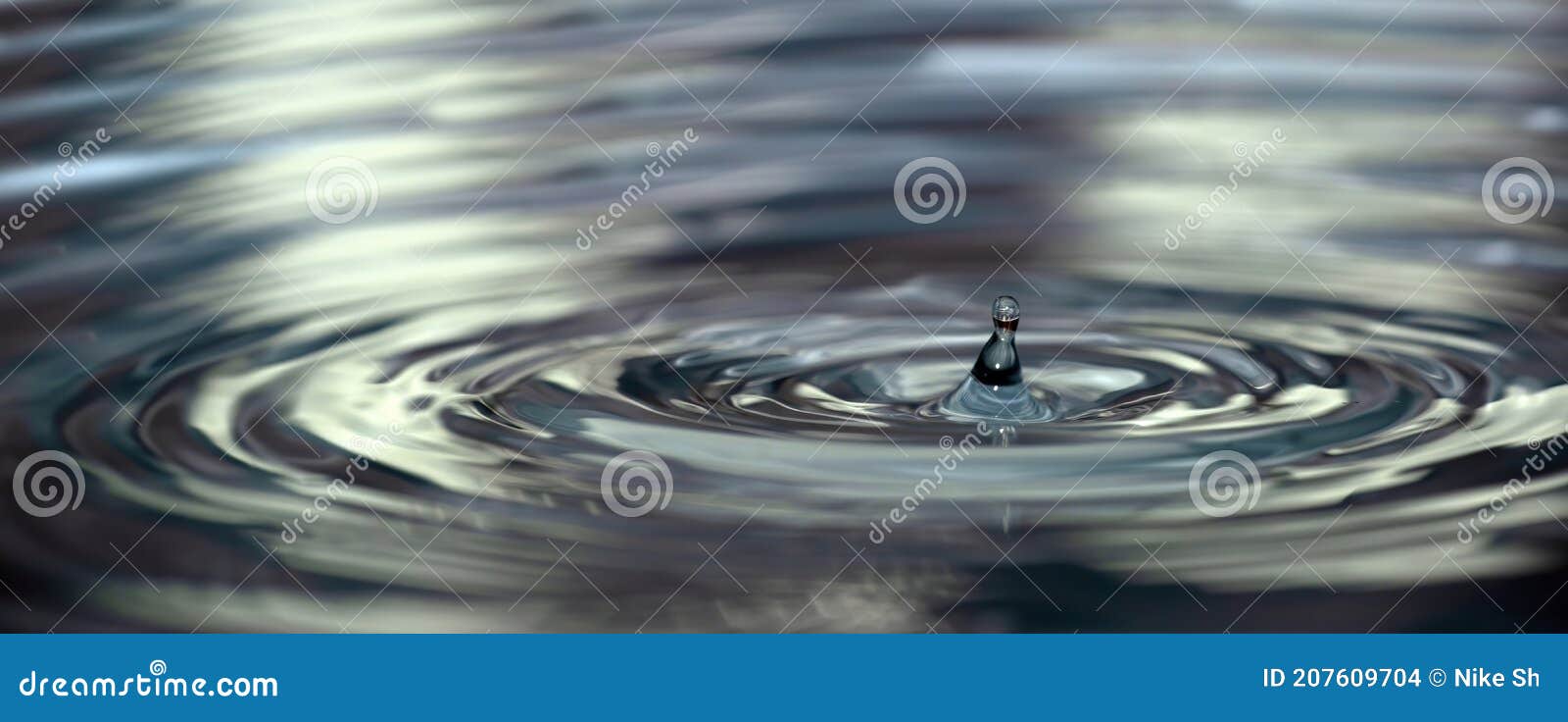 A water drop and ripple stock photo. Image of shadows - 207609704