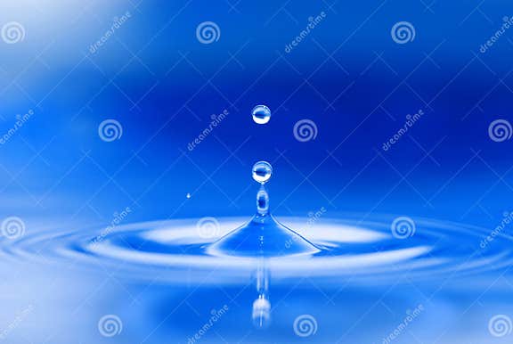 Water Drop Dripping on a Water Surface Stock Illustration ...