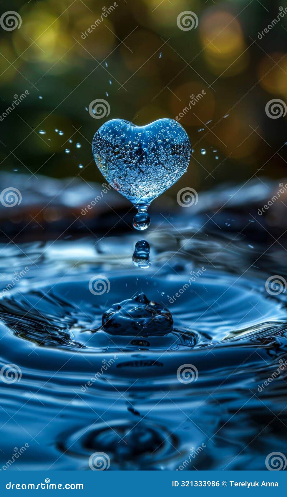 Water Drop Falling from Above with Heart Shape Reflection in it Stock ...