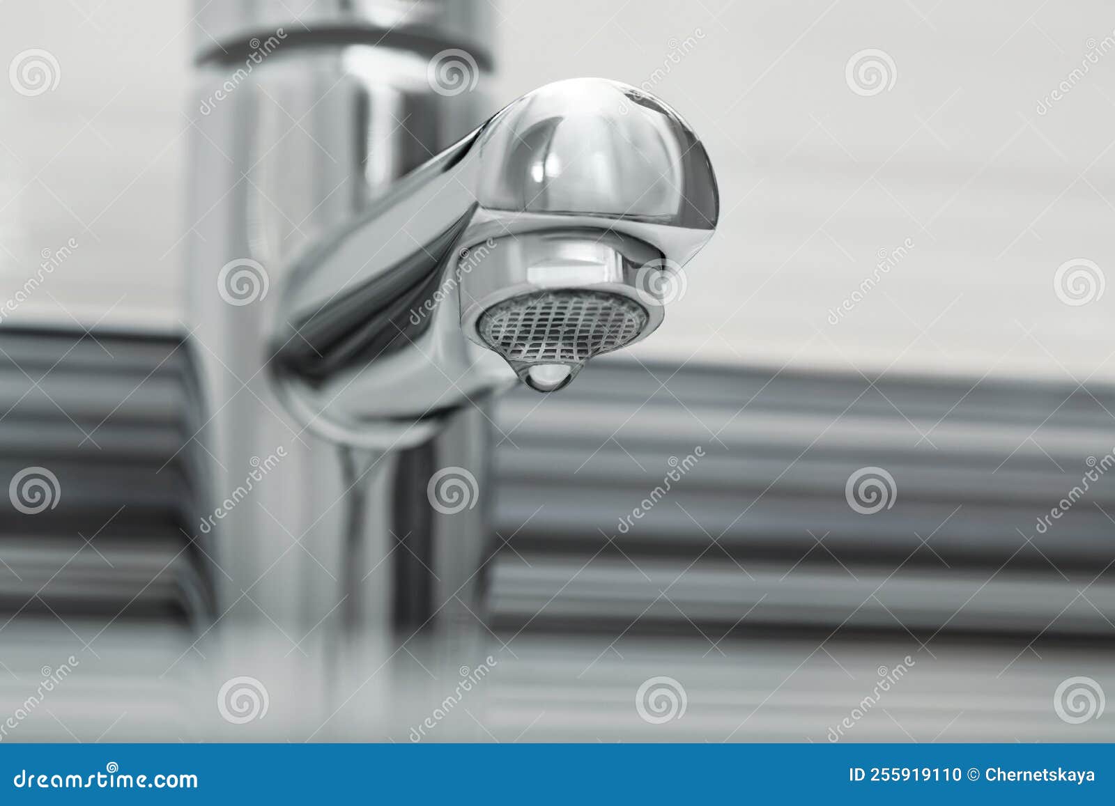 Water Drop Falling Down from Tap in Bathroom, Closeup Stock Photo ...