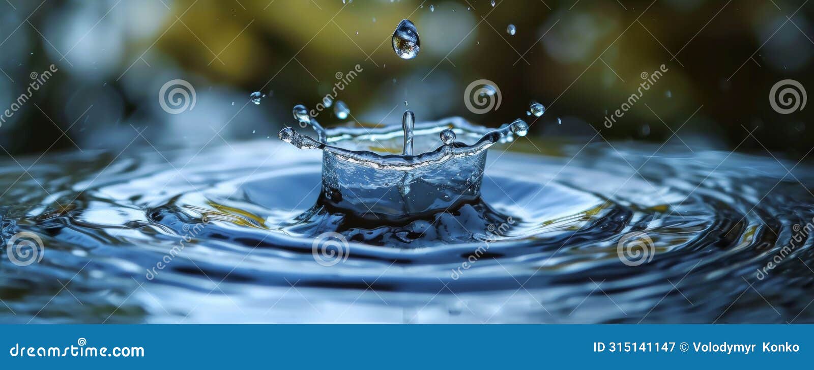 A Water Drop Falling into a Pool of Water Stock Image - Image of ...