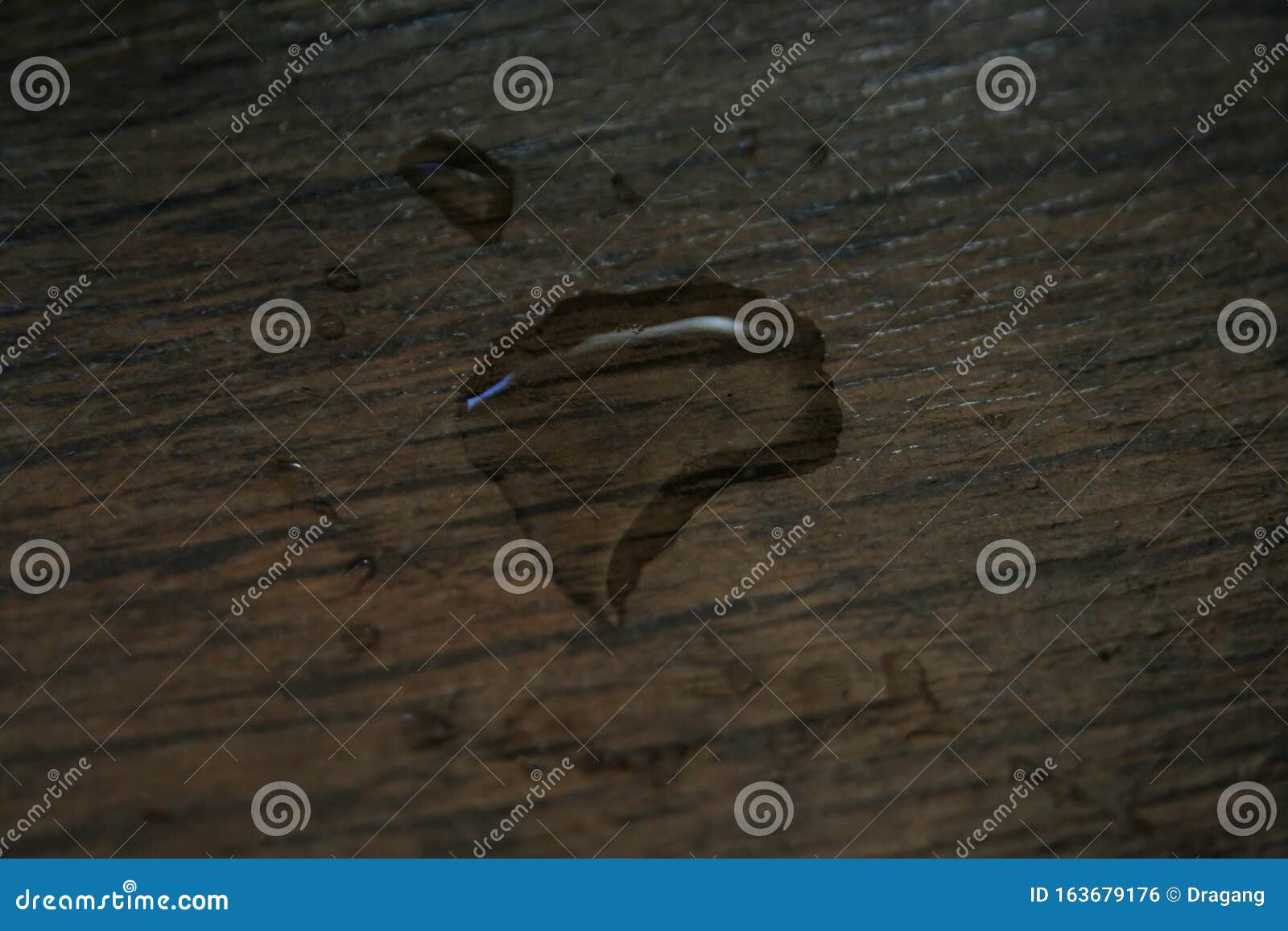 Water Drop on a Floor. Drop on a Wooden Floor Stock Photo - Image of ...