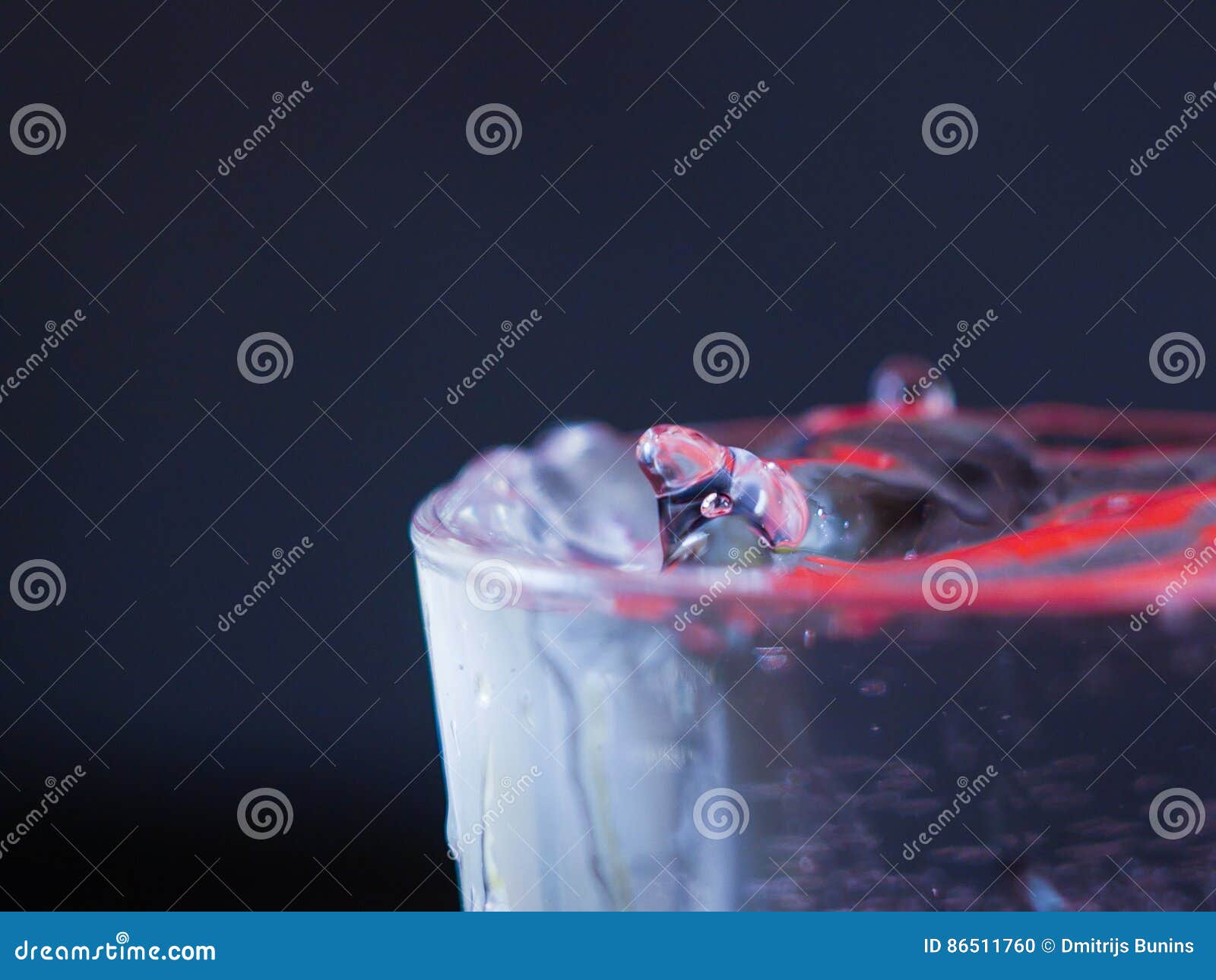 Water Drop in Glass on Dark Bacground, Close Up Stock Photo - Image of ...