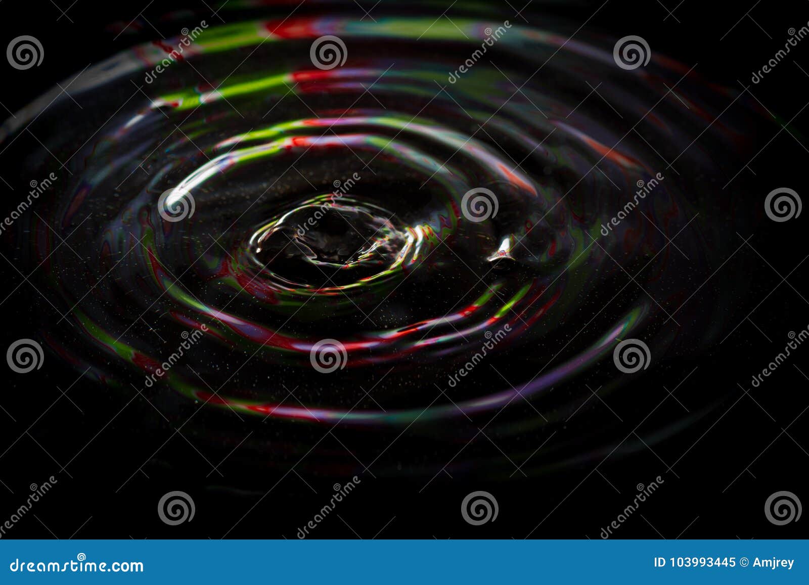 Water drop making ripples stock image. Image of violet - 103993445