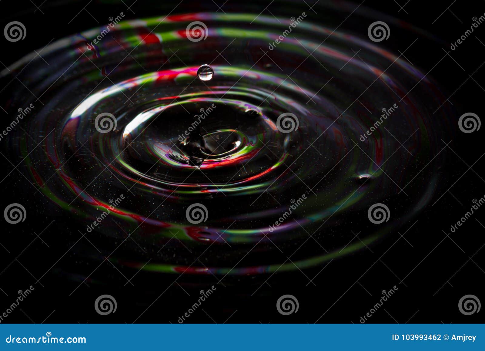 Water drop making ripples stock photo. Image of mauve - 103993462