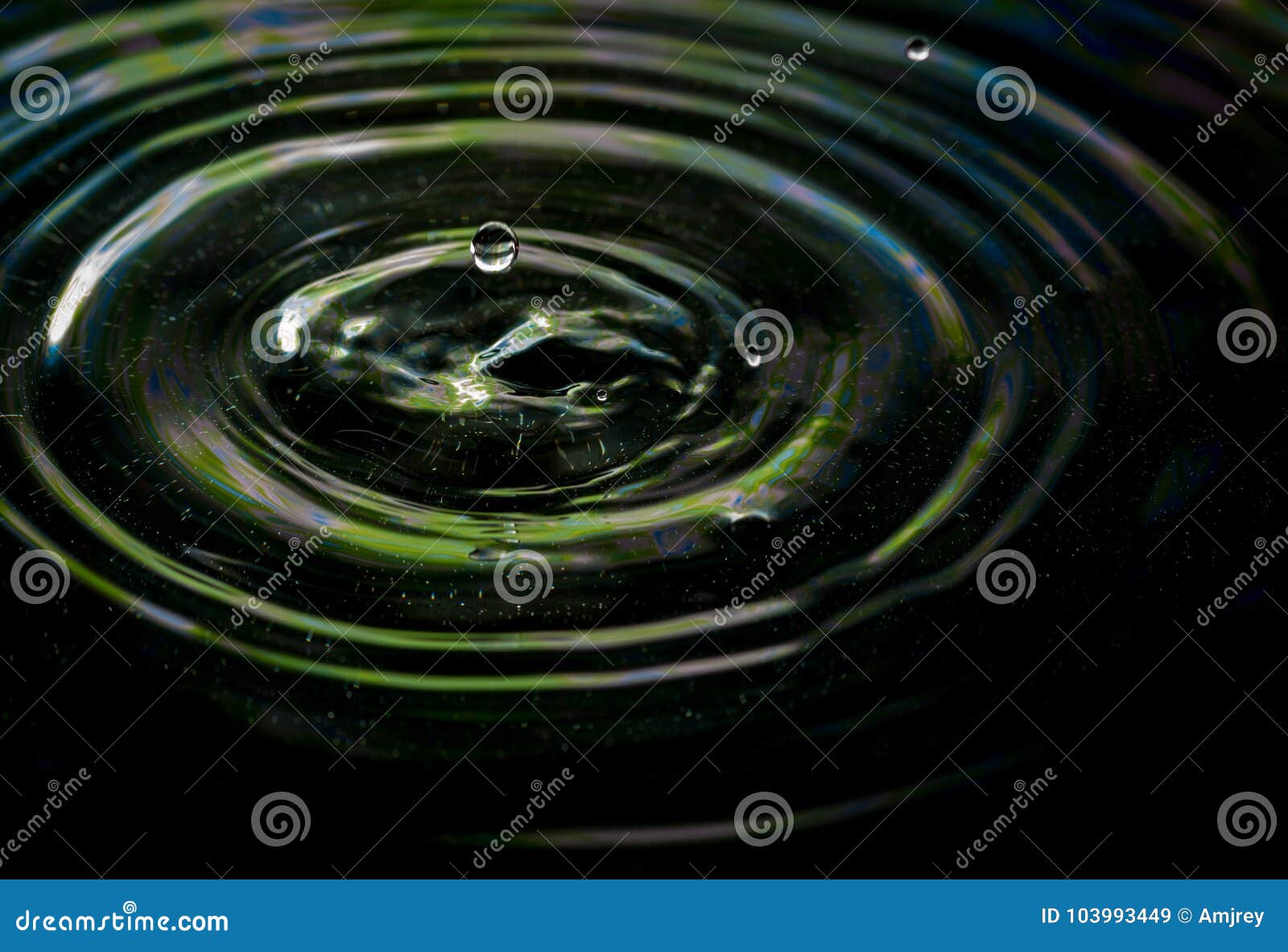 Water drop making ripples stock image. Image of light - 103993449