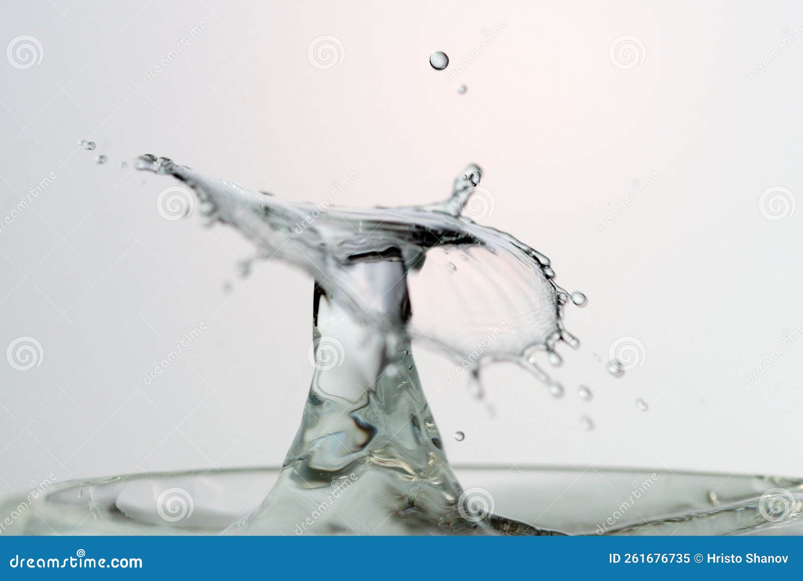 Water Drop Splash with Ripples on Water Surface Stock Image - Image of ...